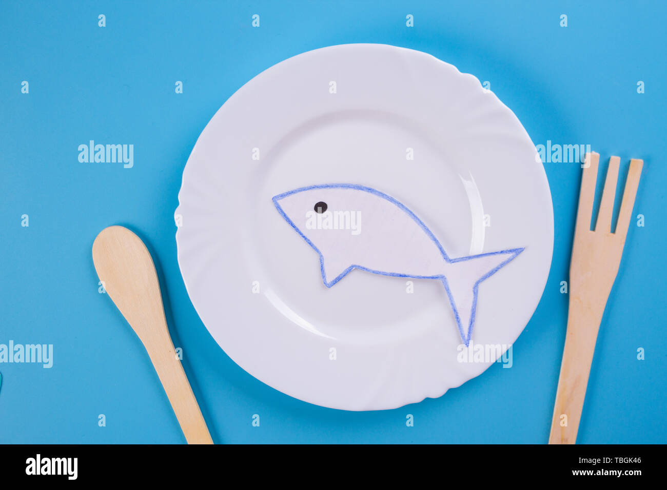 fish in the plate. cartoon styled Stock Photo - Alamy