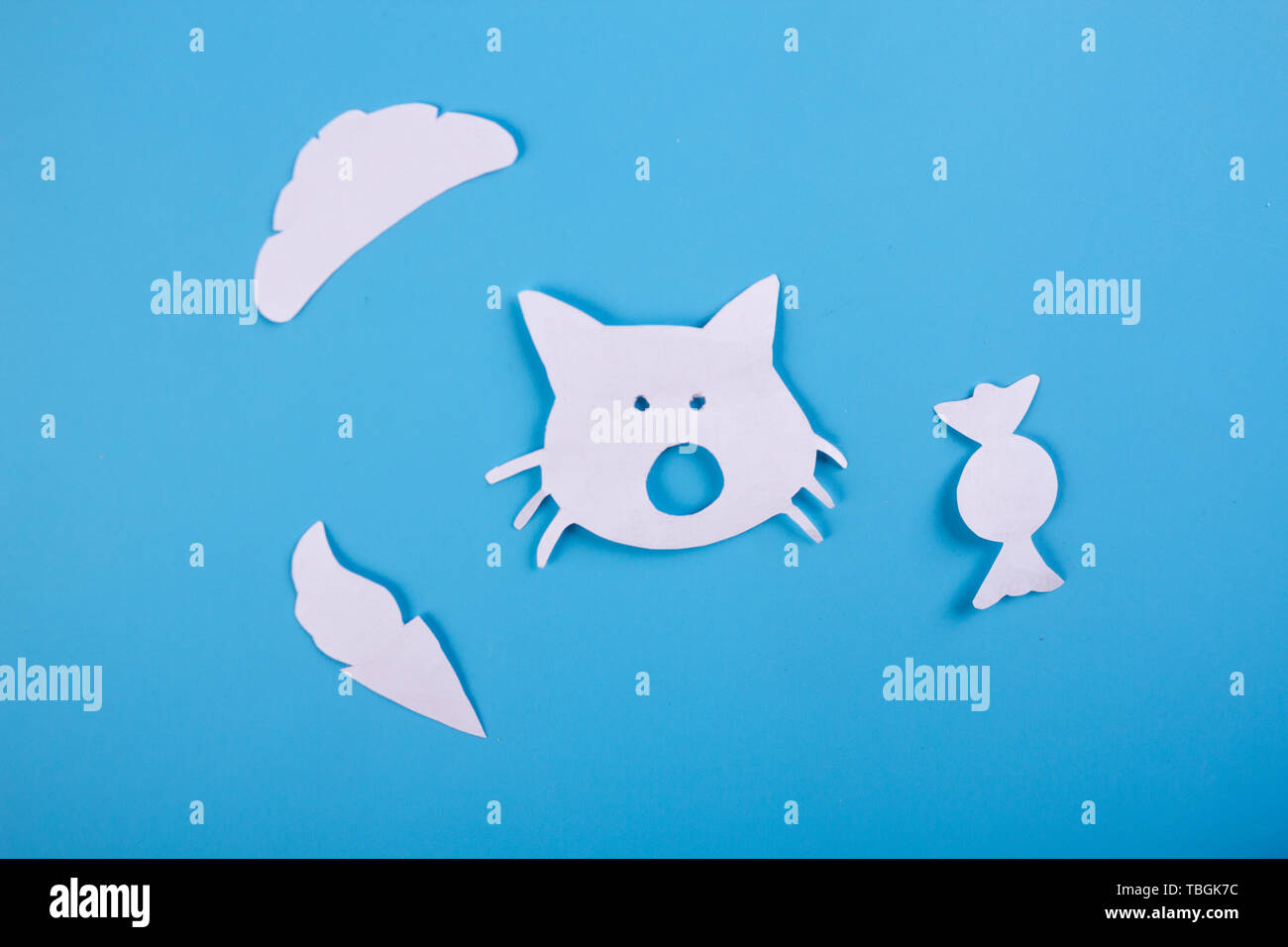 funny hunger concept. hungry cartoon cat on blue background Stock Photo ...