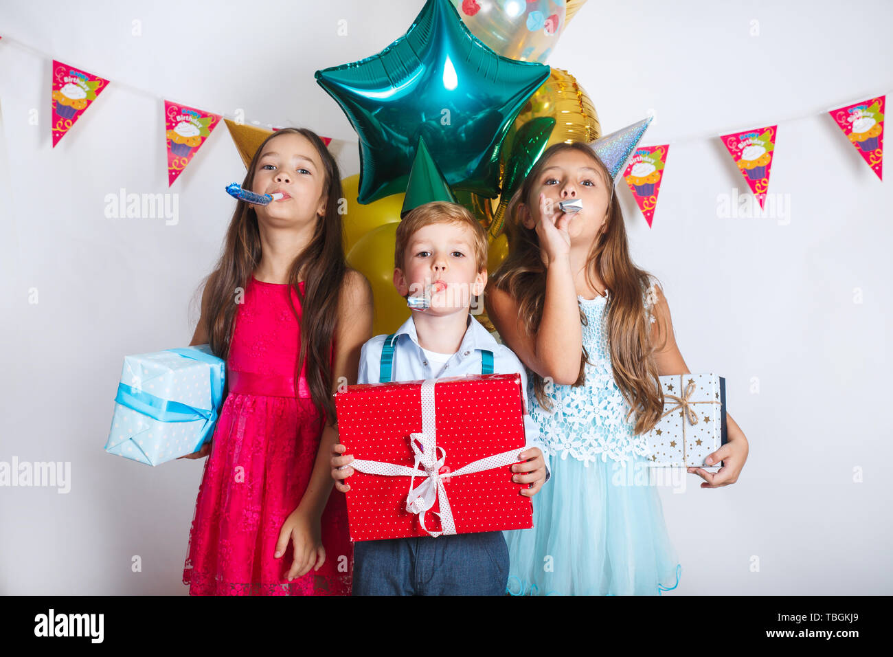 Group of kids celebrate birthday party together and having fun Stock ...
