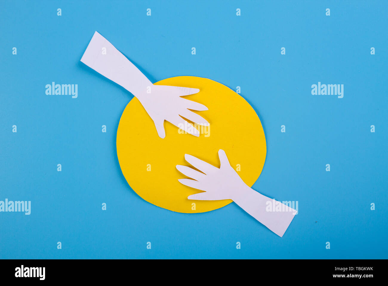 two hands reaching for each other. help concept Stock Photo - Alamy