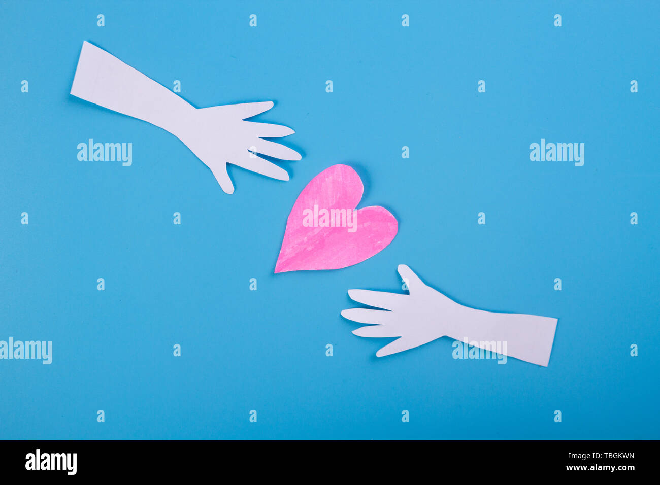 two hands reaching for each other. help concept Stock Photo - Alamy