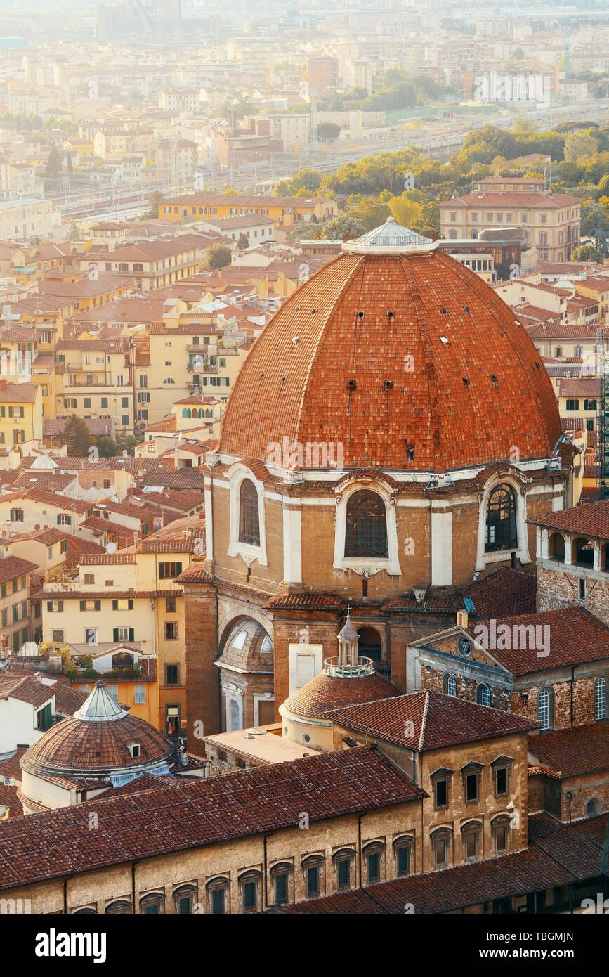 Florence rooftop view with Medici Chapels dome in Italy at sunrise ...