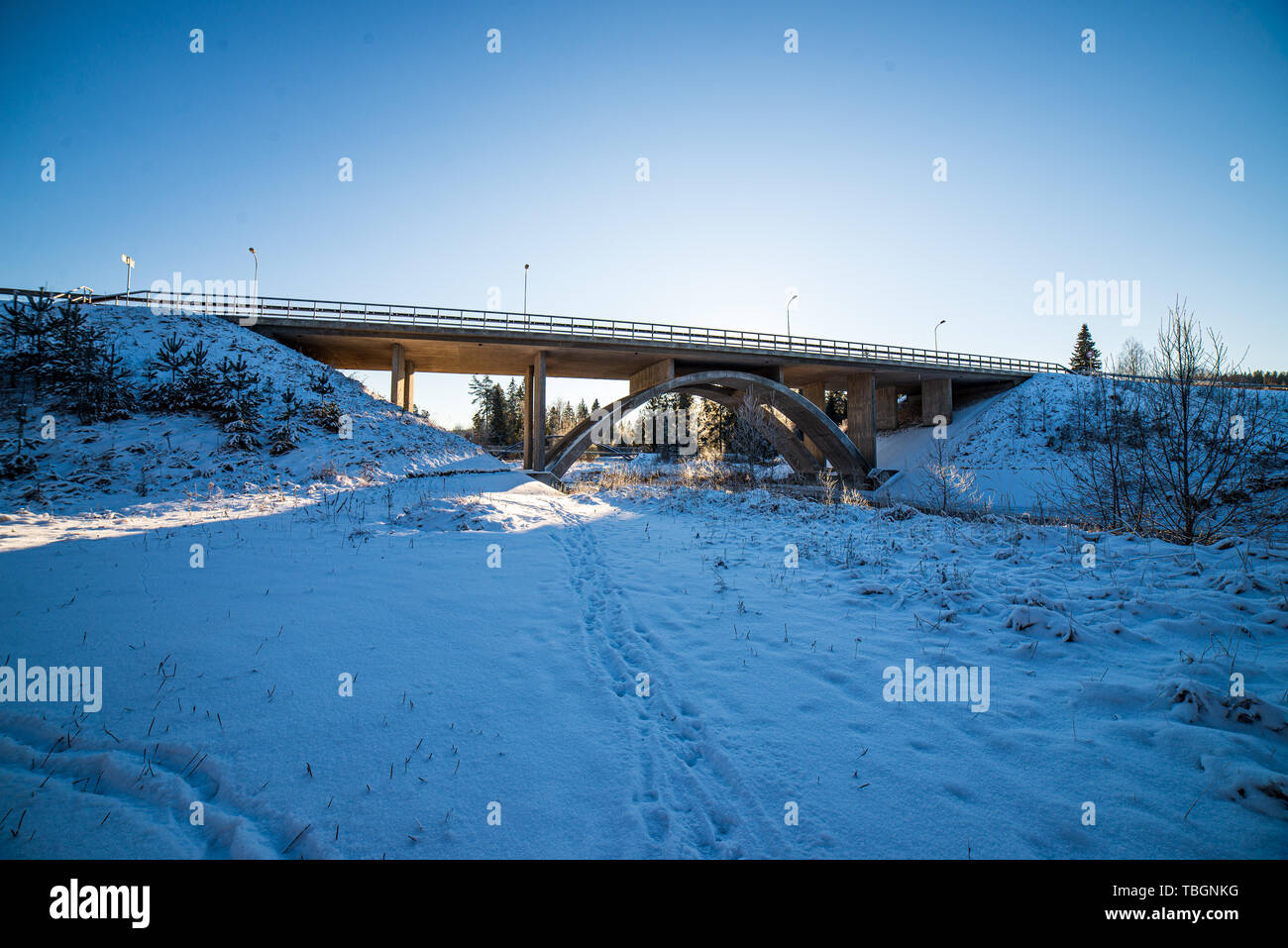 metal bridge over the river in country in winter frost Stock Photo - Alamy