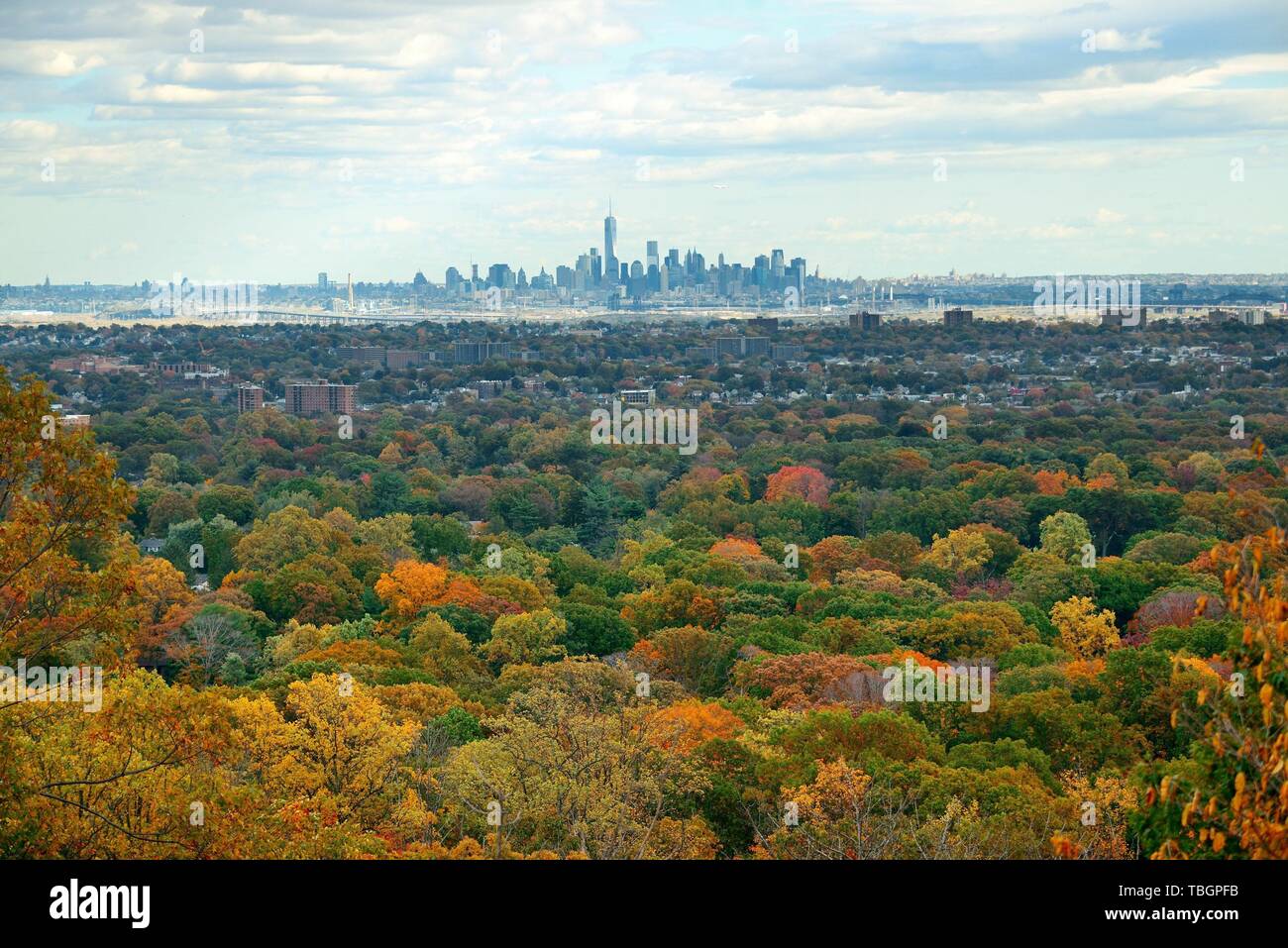 New York City skyline viewed from park with Autumn foliage Stock Photo ...