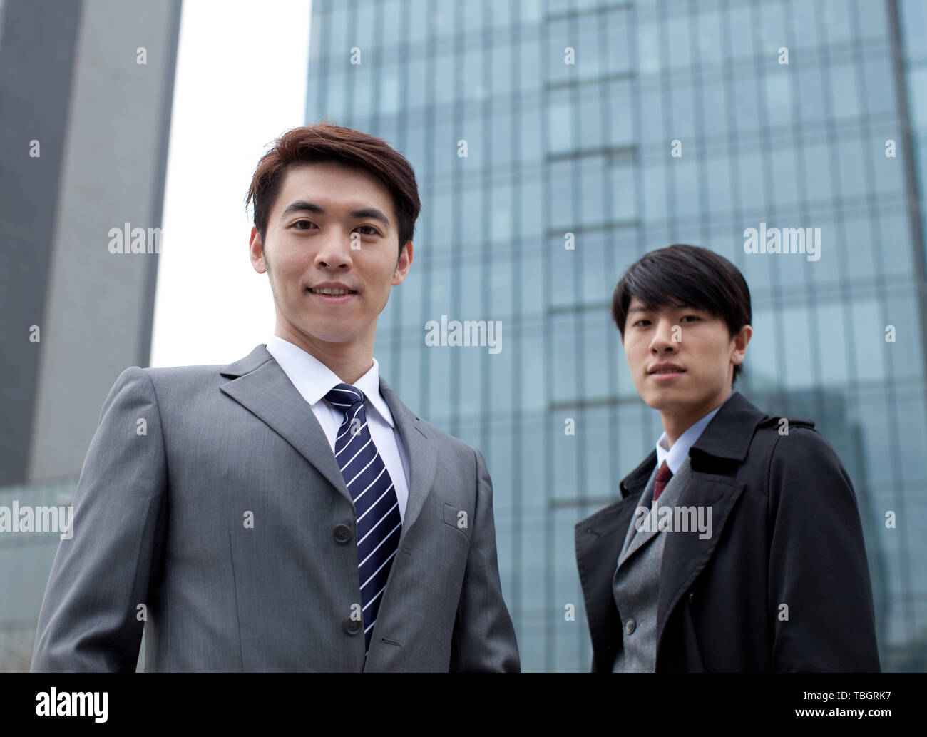 Business white-collar workers in front of the office building Stock ...