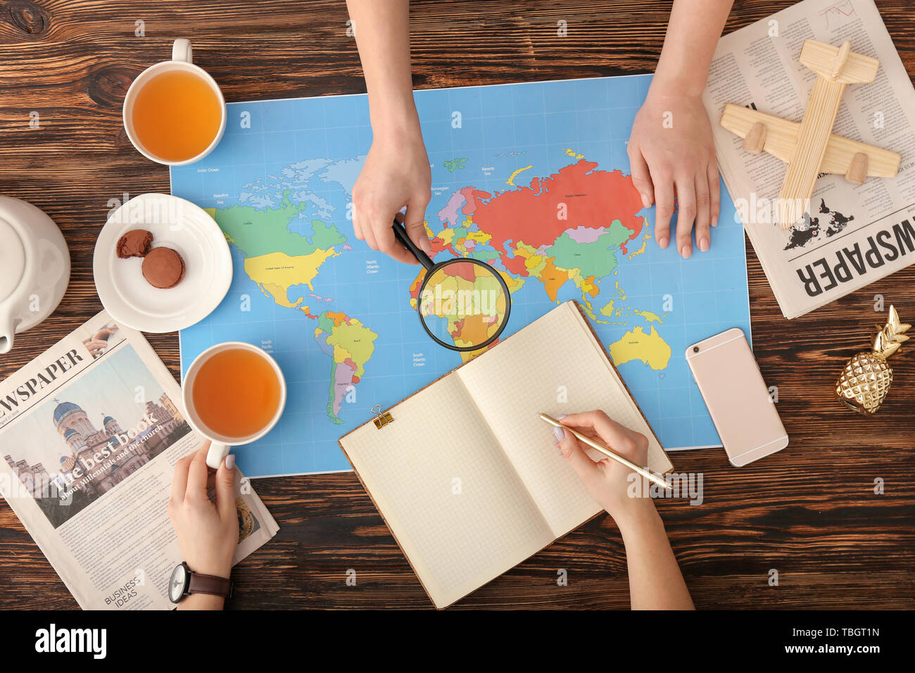 Business people discussing world map hi-res stock photography and ...