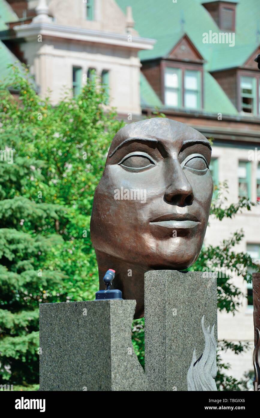 Statue and historical buildings in Quebec City Stock Photo - Alamy