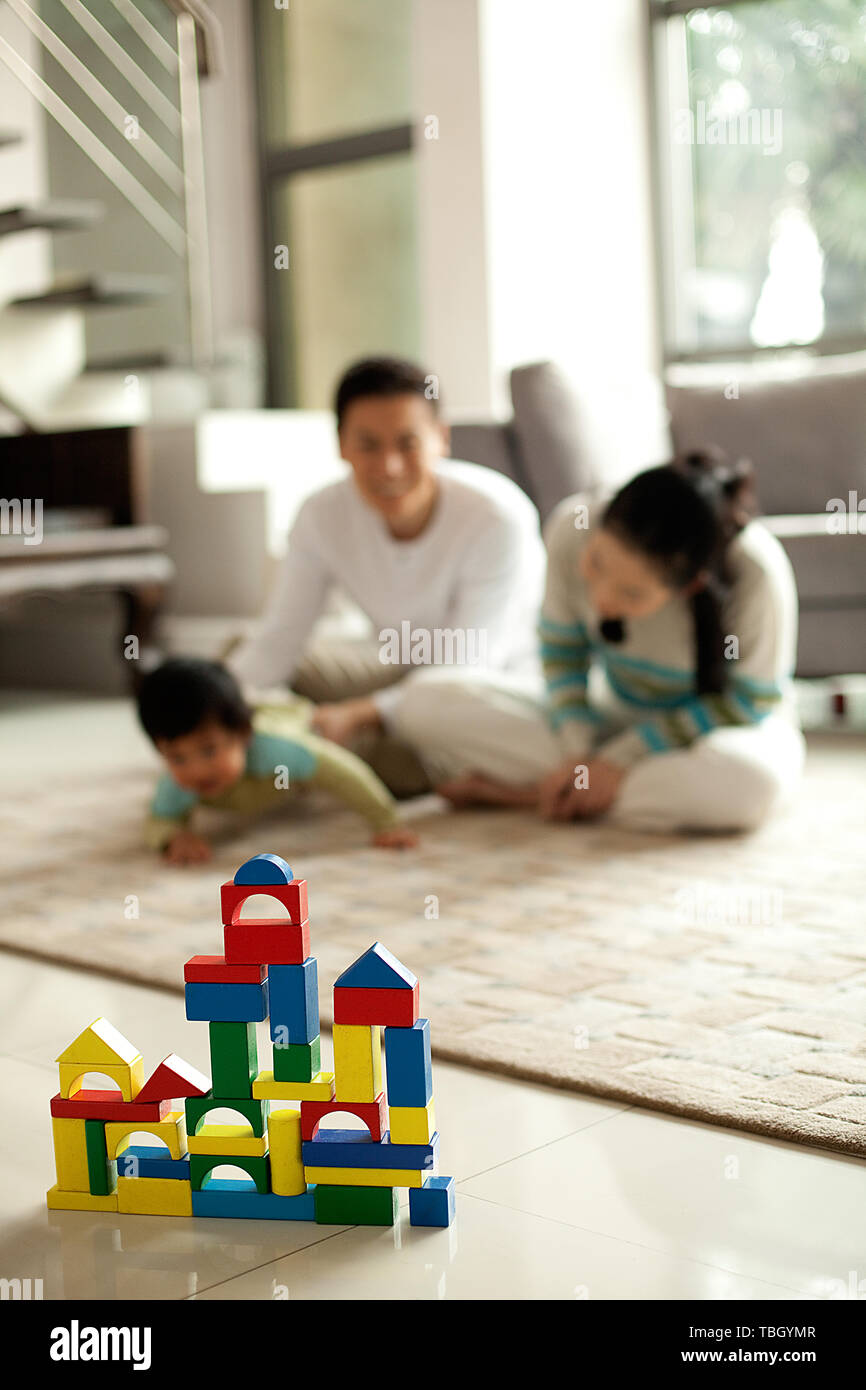 Parents and children play games Stock Photo - Alamy