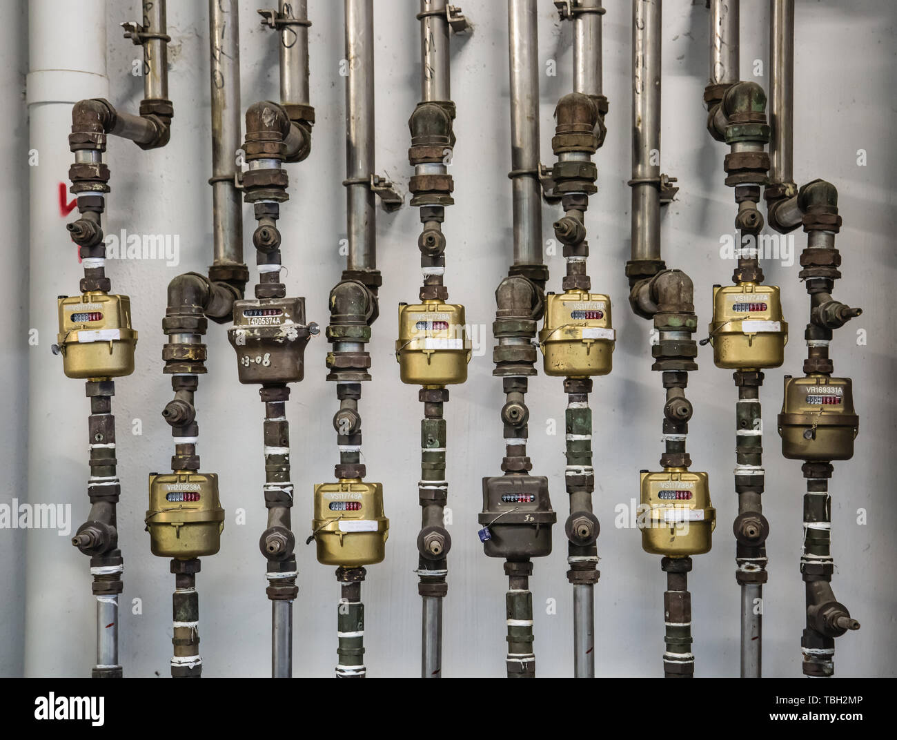 metal pipe meter background view Stock Photo - Alamy