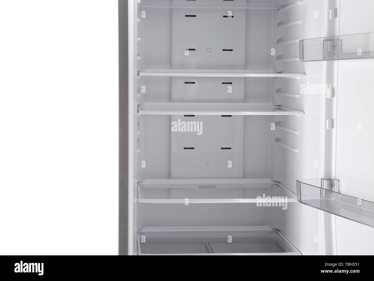 Open empty fridge on white background Stock Photo - Alamy
