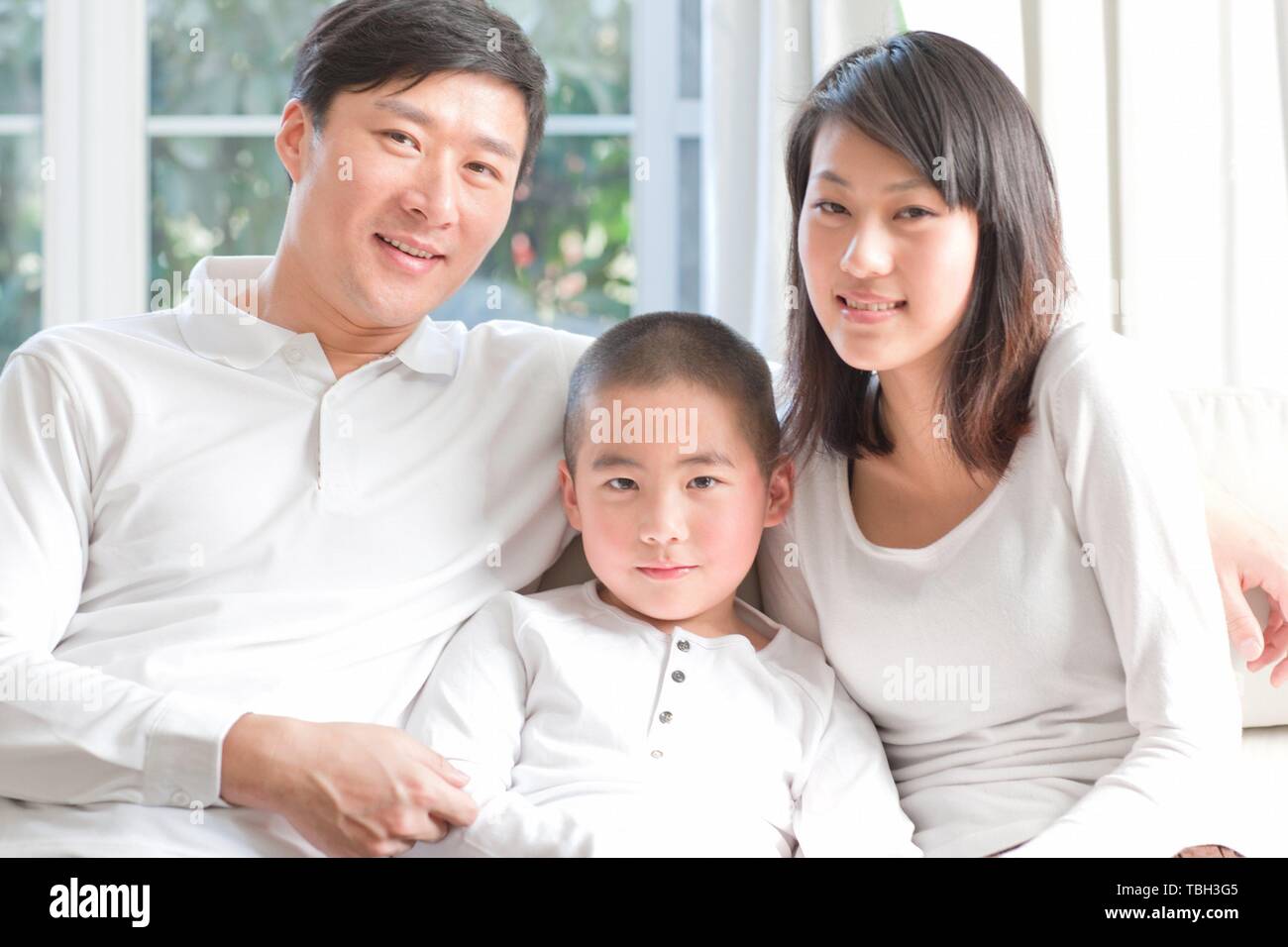 a family of three Stock Photo - Alamy