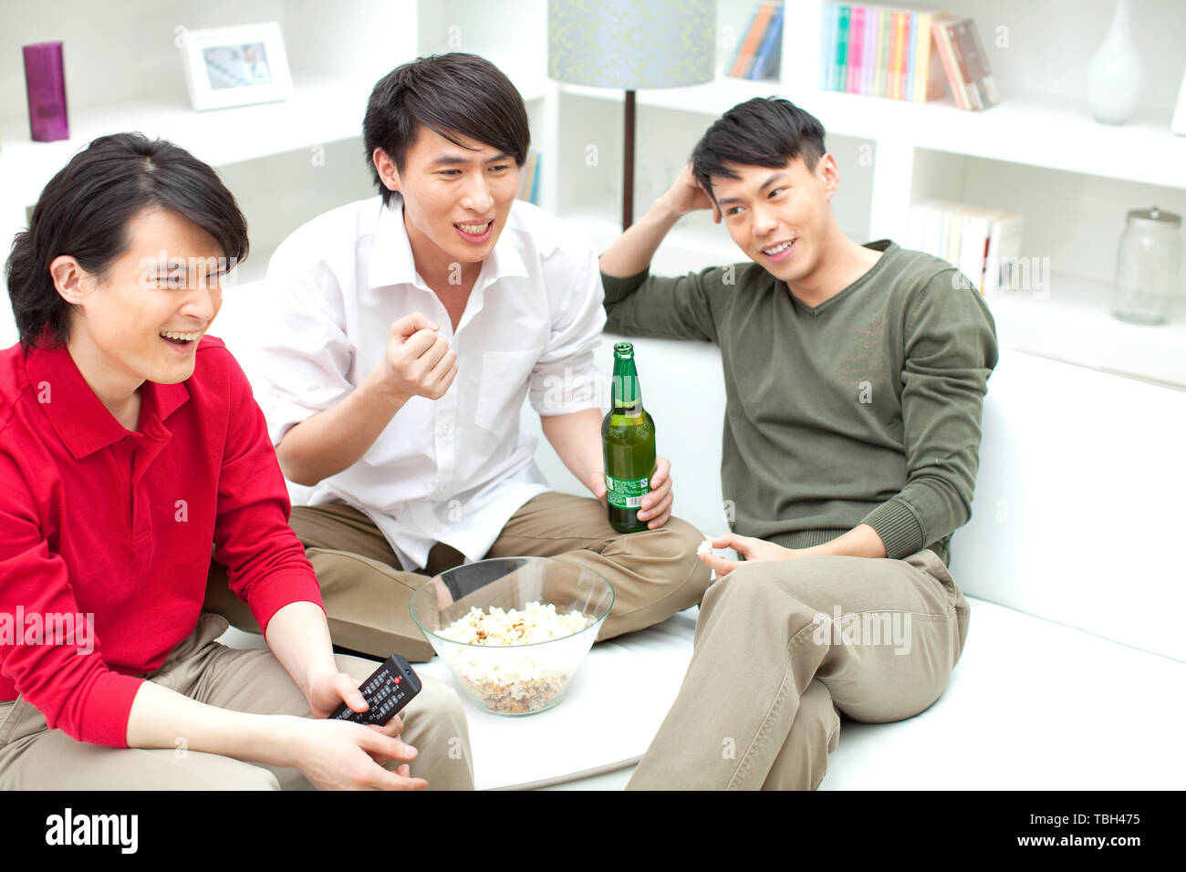 A party of three men Stock Photo - Alamy