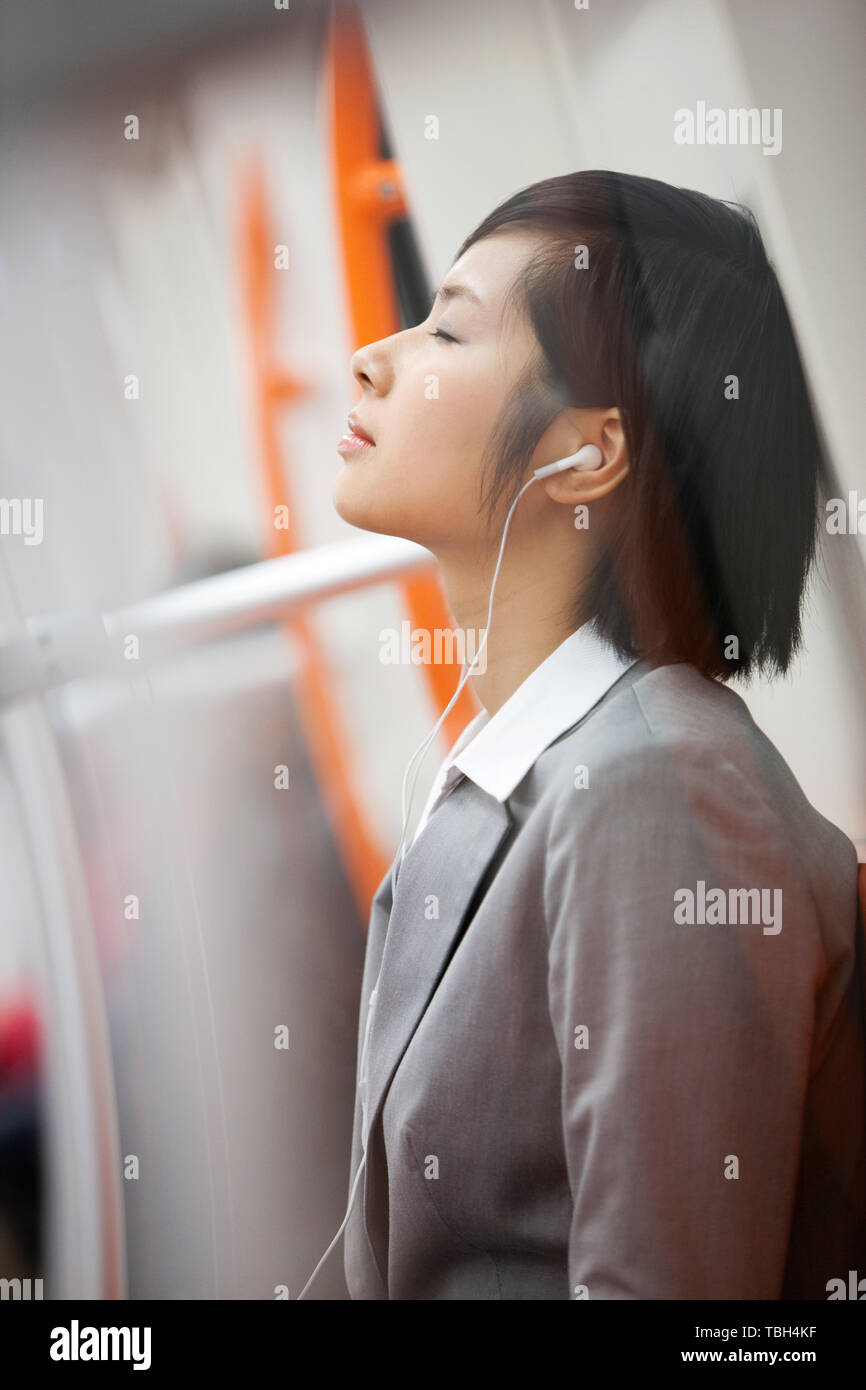 Business people take the subway on their commute to and from work Stock ...