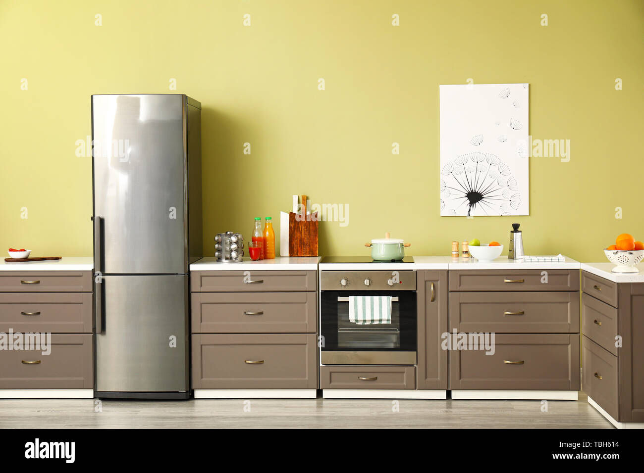 Big modern fridge in interior of kitchen Stock Photo - Alamy
