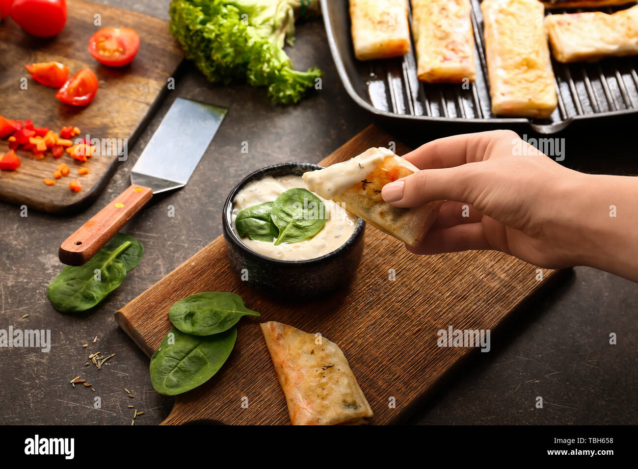 Woman eating vietnamese spring rolls hi-res stock photography and ...