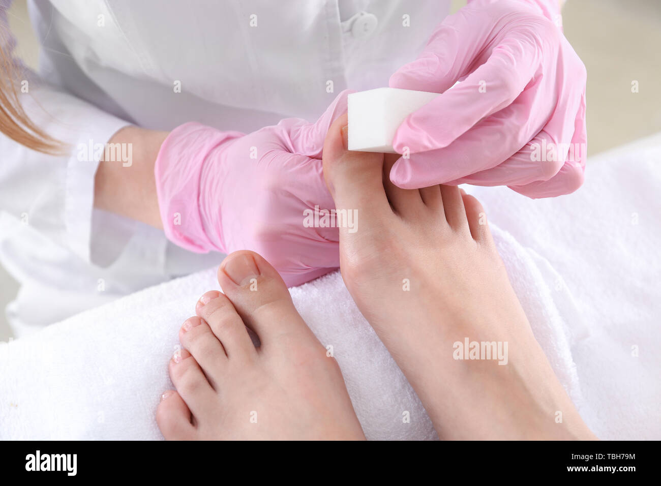 Polishing toes hi-res stock photography and images - Alamy