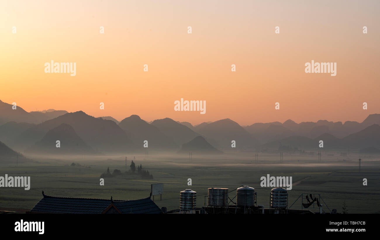Luoping, Yunnan in the spring, the scenery at sunrise Stock Photo - Alamy