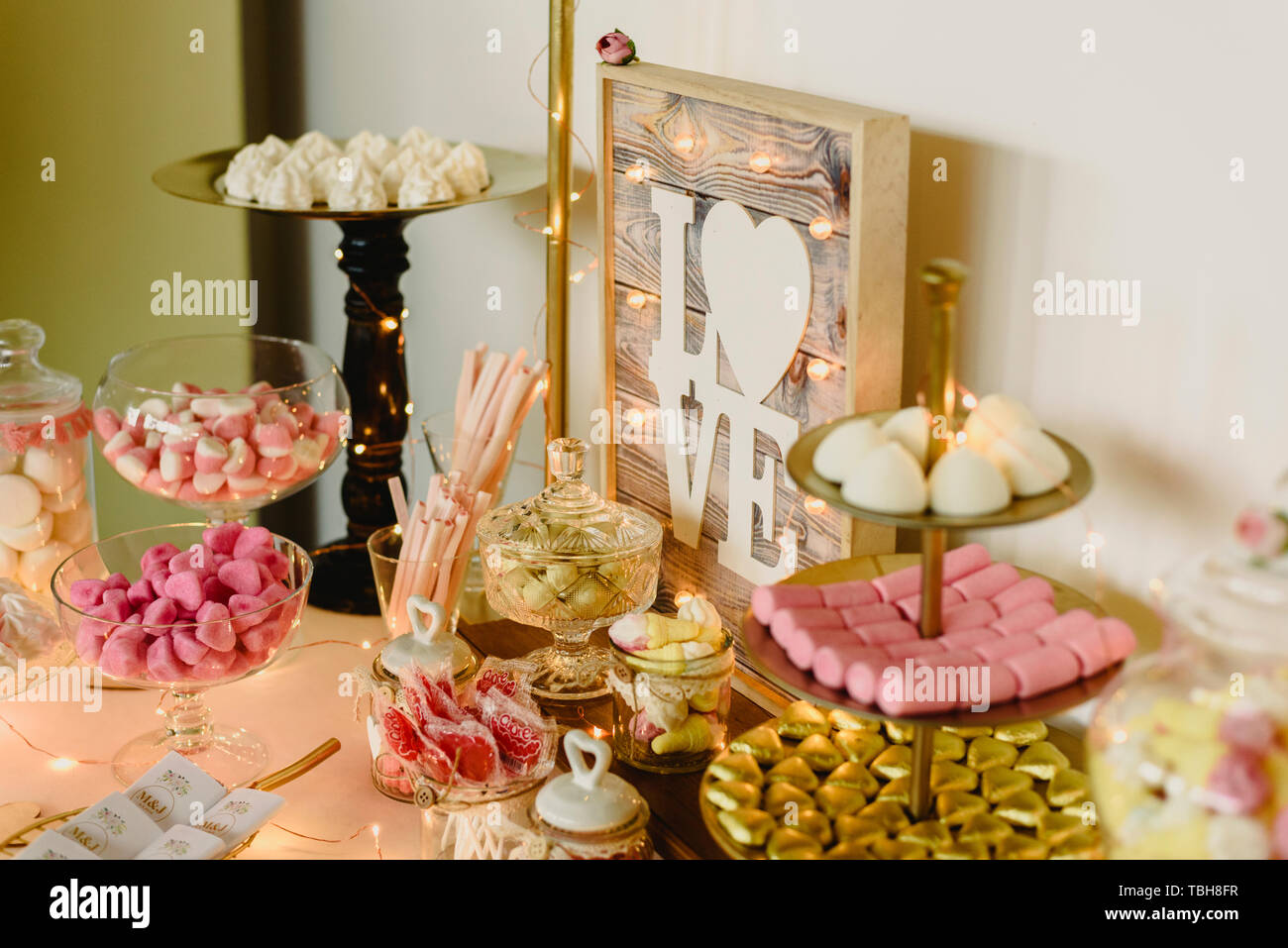 Candy bar beautifully decorated with sweets in a vintage event Stock ...