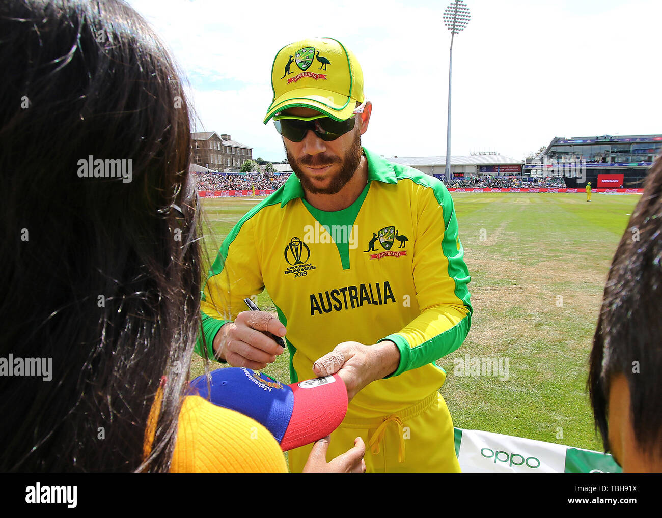 Australia's David Warner signs autographs during the ICC Cricket World ...