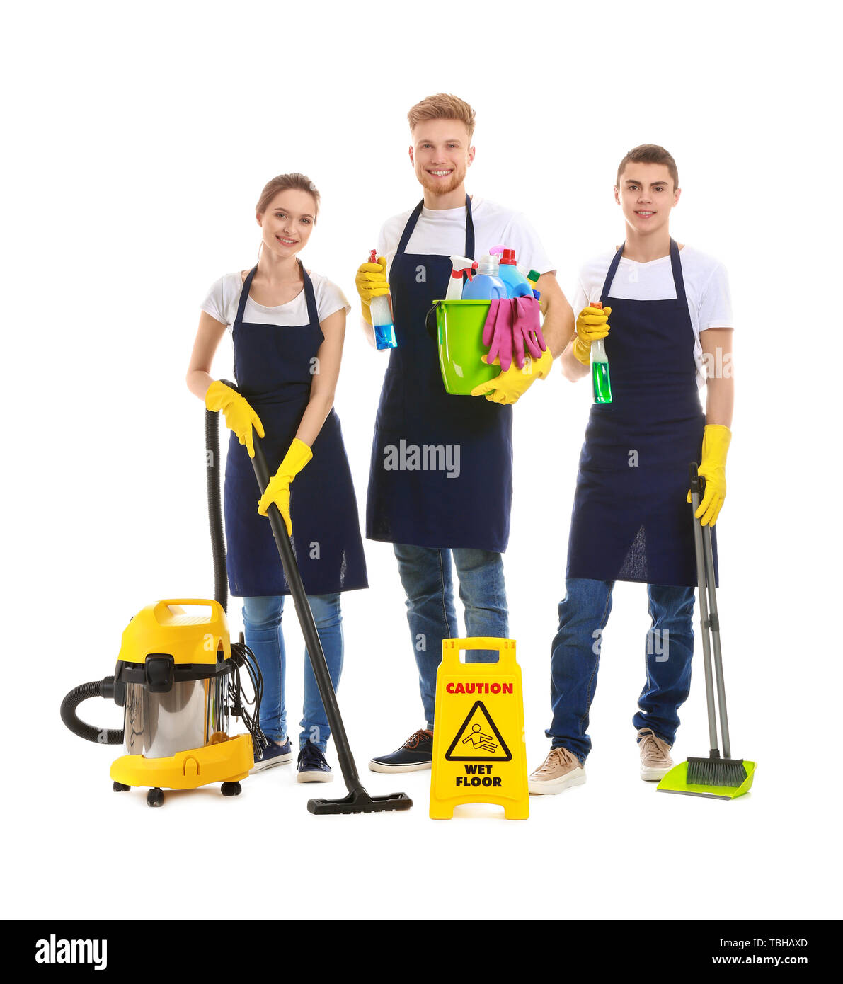 Team of janitors with cleaning supplies on white background Stock Photo ...