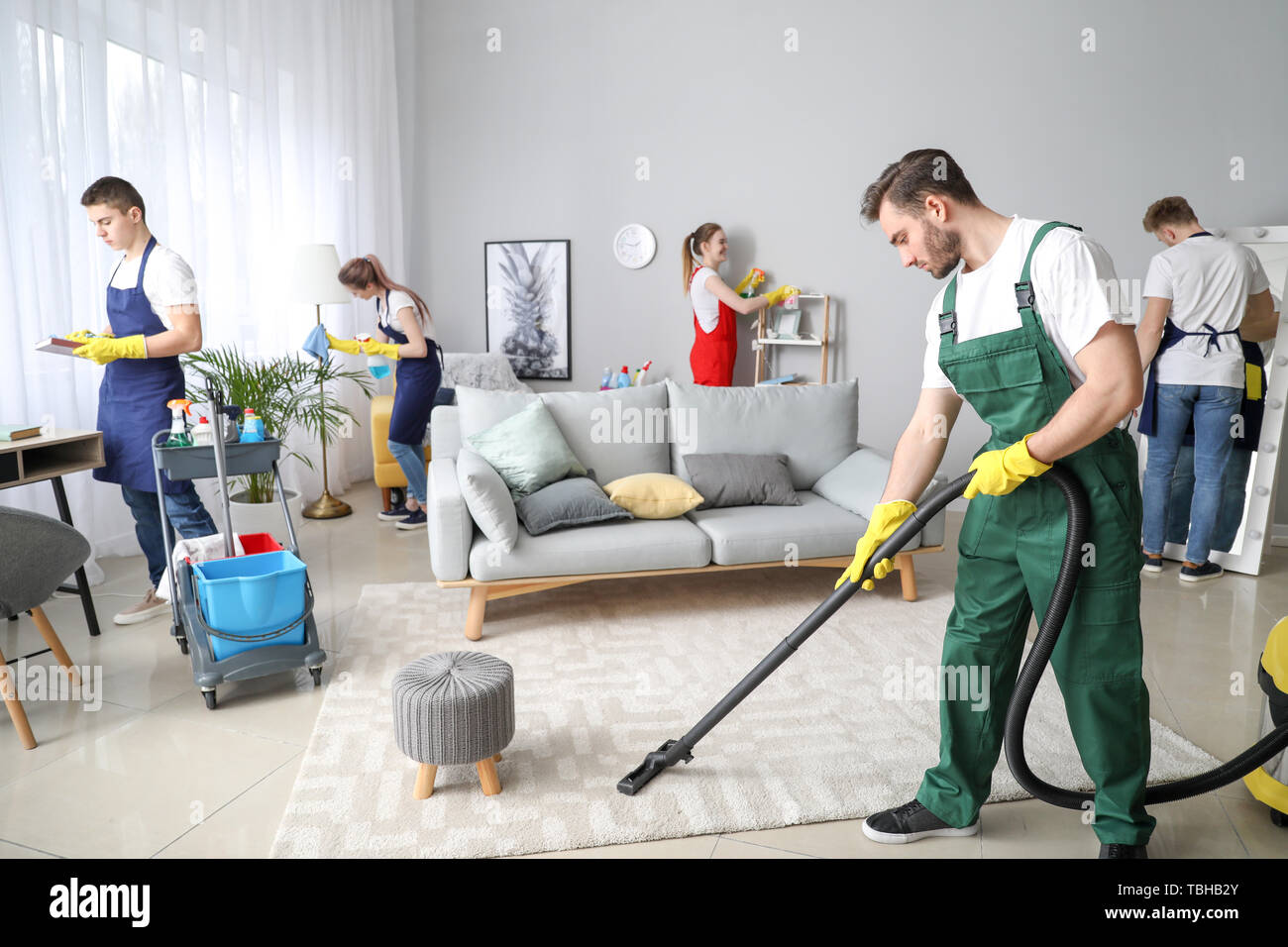 Team janitors cleaning room hi-res stock photography and images - Alamy