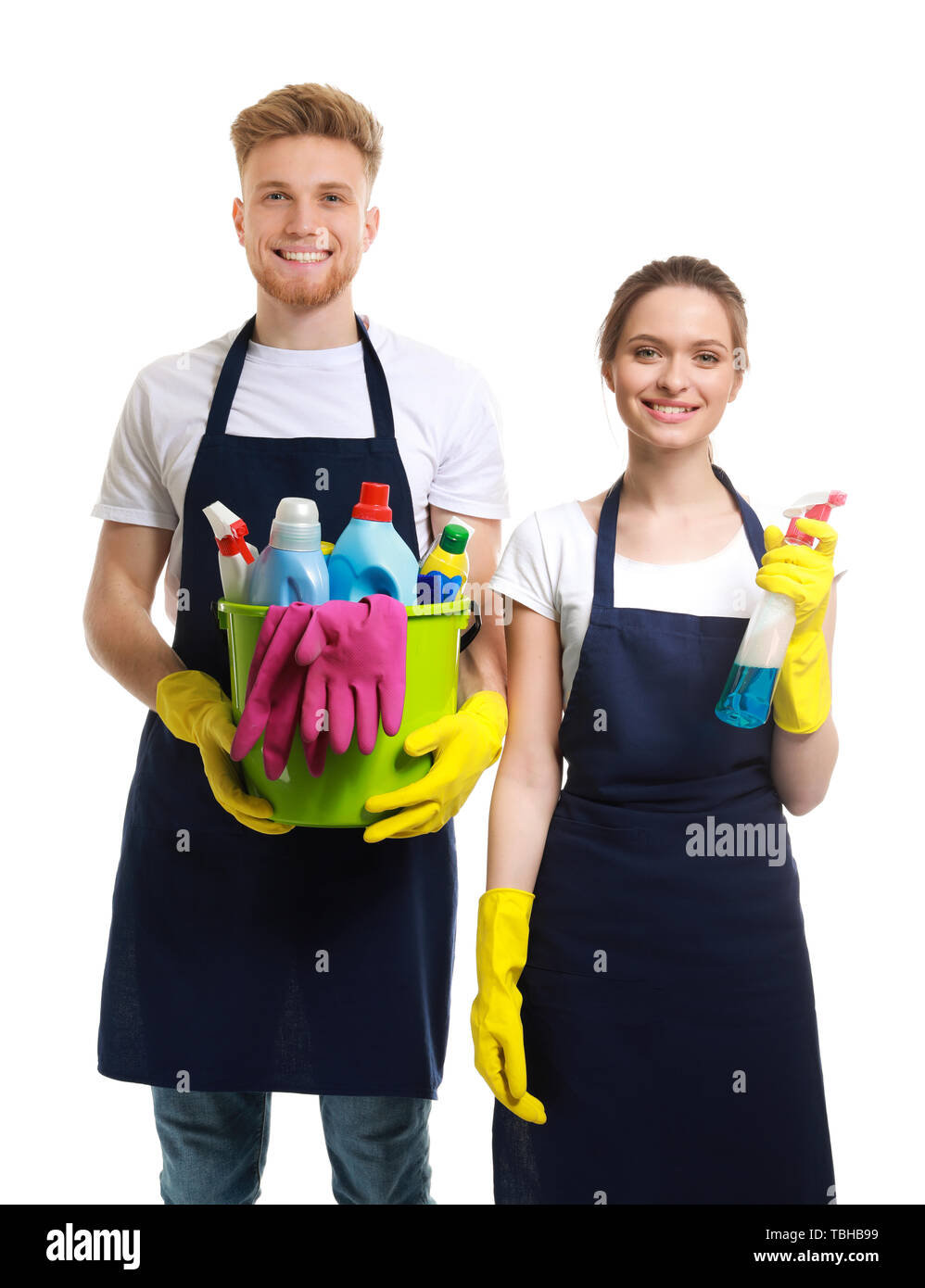 Team of janitors with cleaning supplies on white background Stock Photo ...
