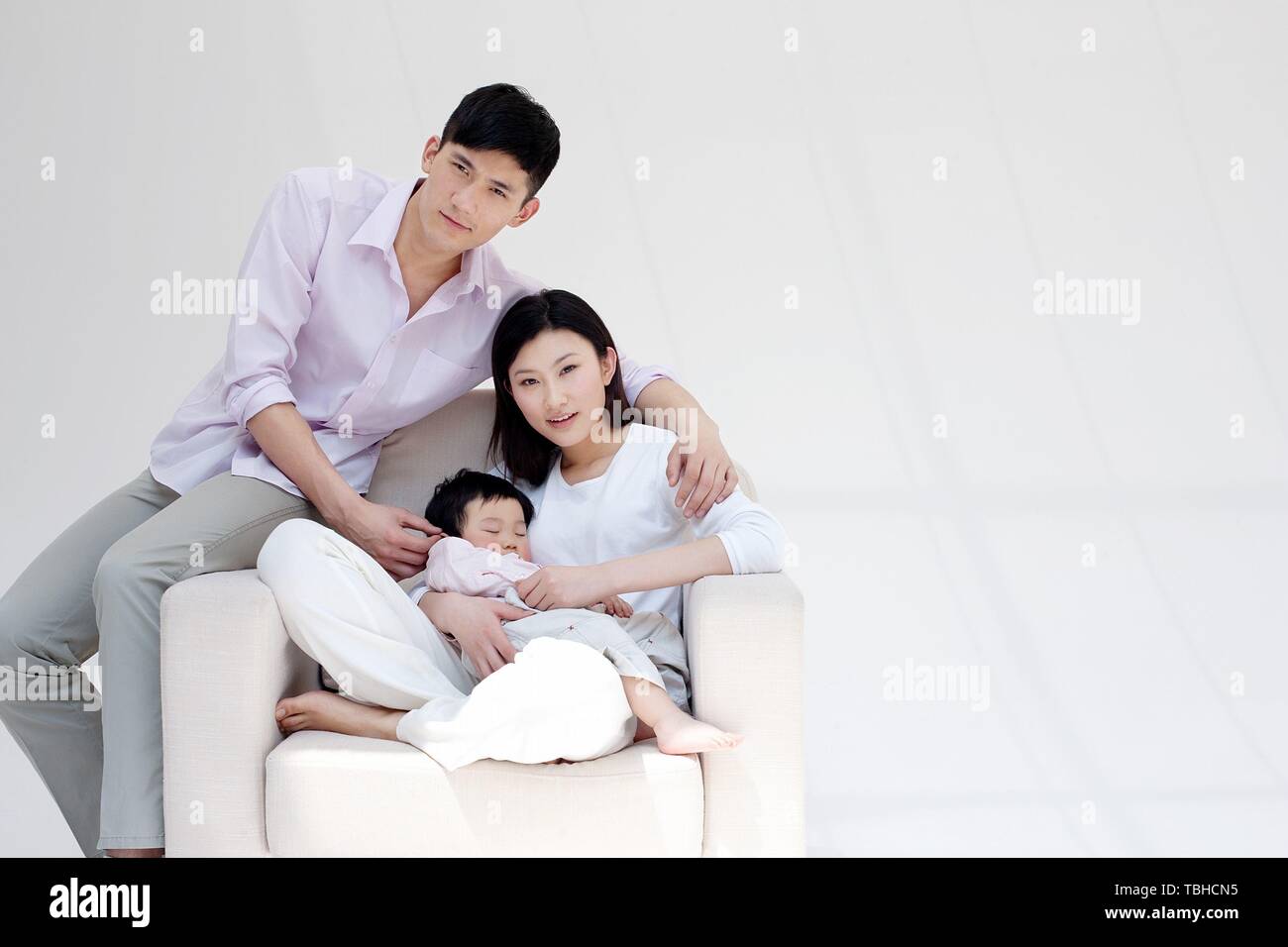 A family of three Stock Photo - Alamy