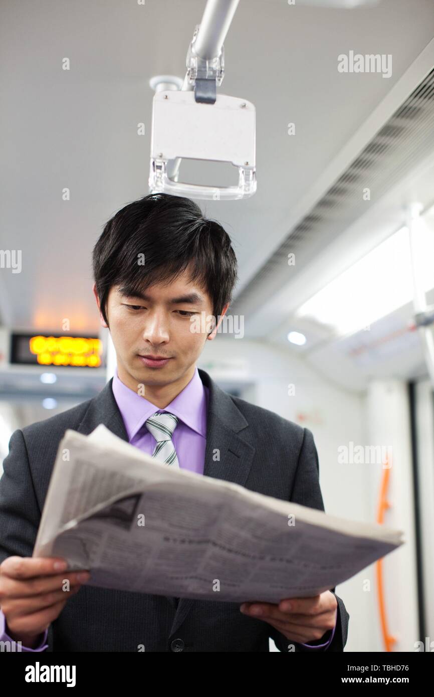 Standing reading figure hi-res stock photography and images - Alamy