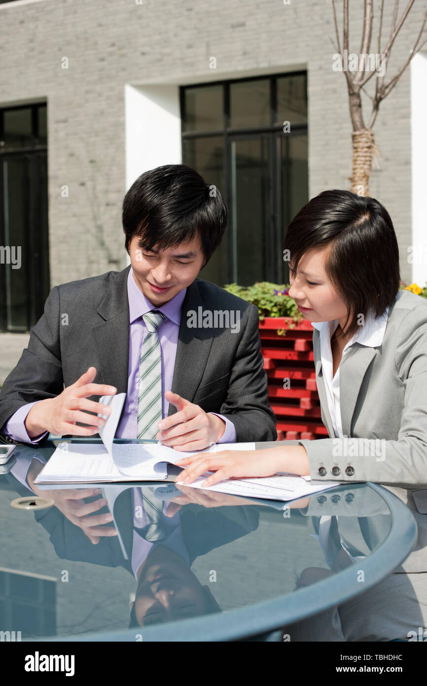 Man smiling sitting outdoor hi-res stock photography and images - Alamy