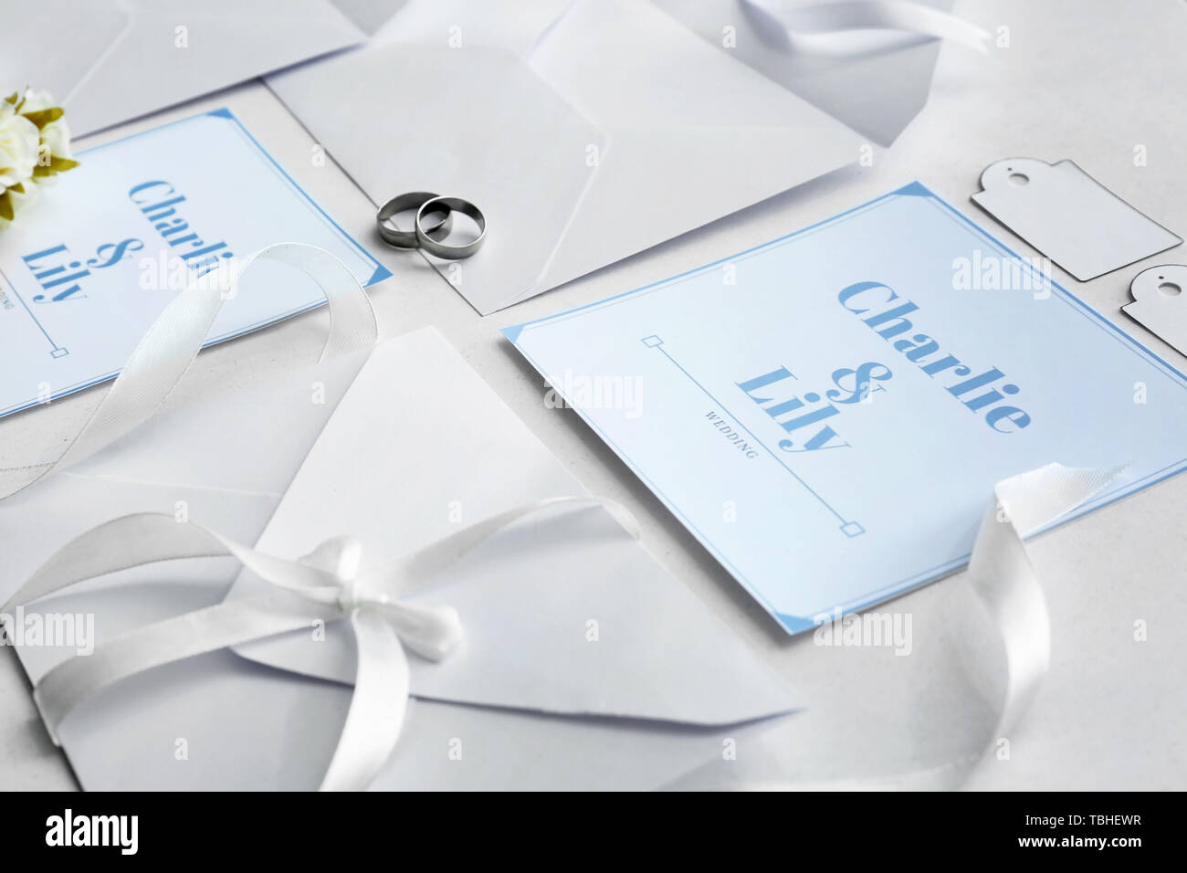 Wedding invitations on white background Stock Photo - Alamy