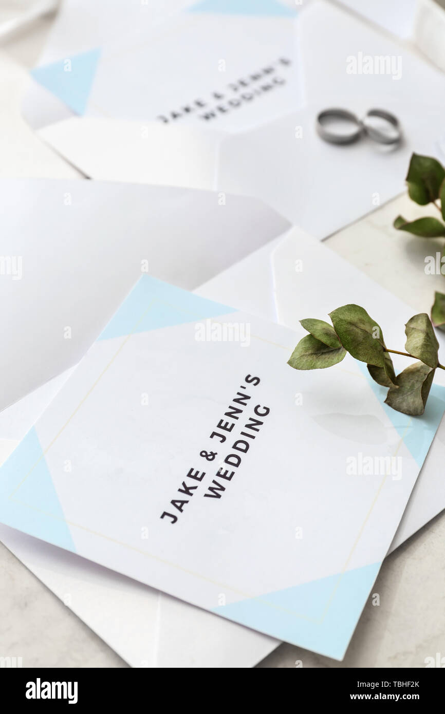 Wedding invitations on light background Stock Photo - Alamy