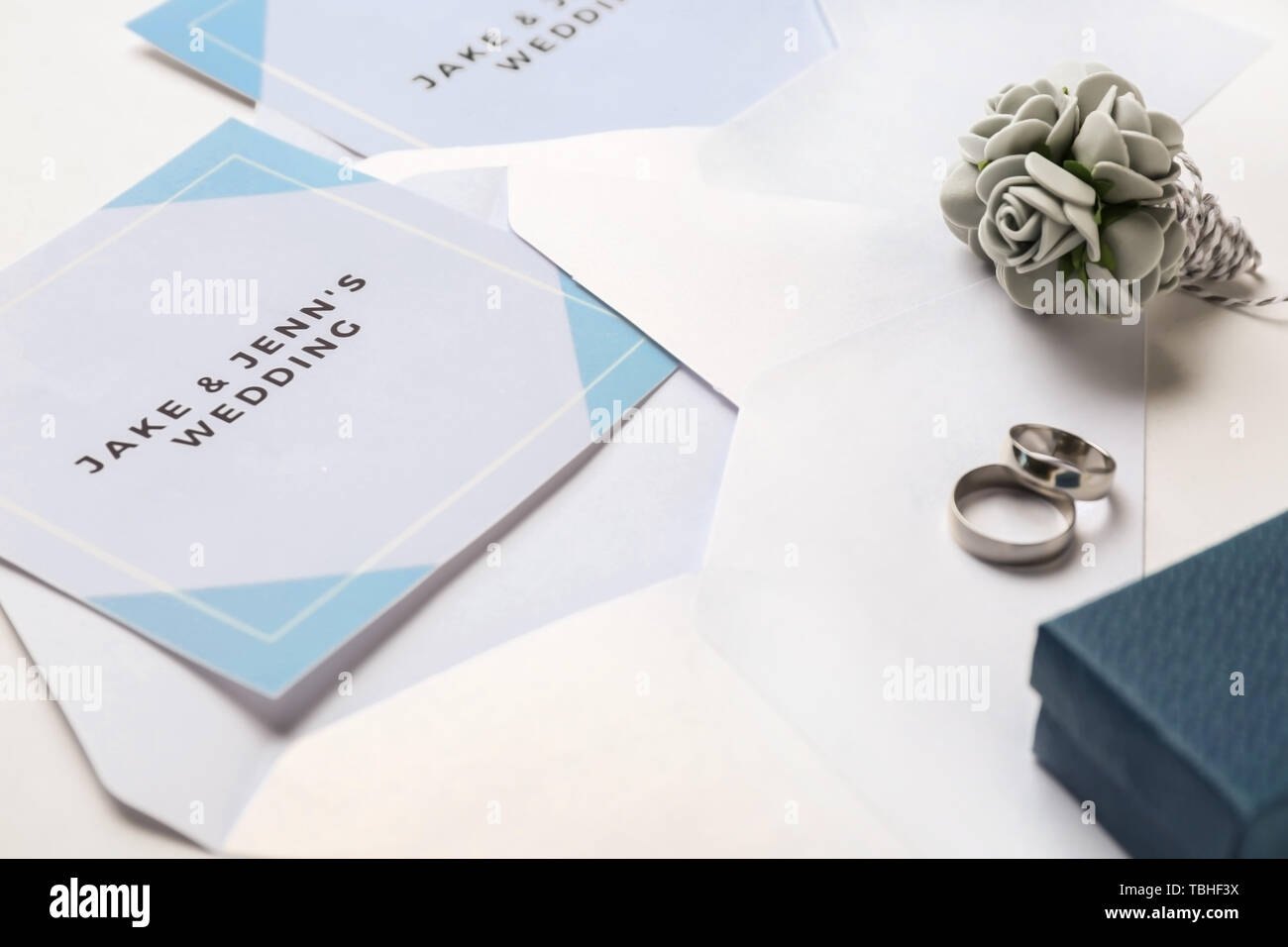 Wedding invitation on white background Stock Photo - Alamy