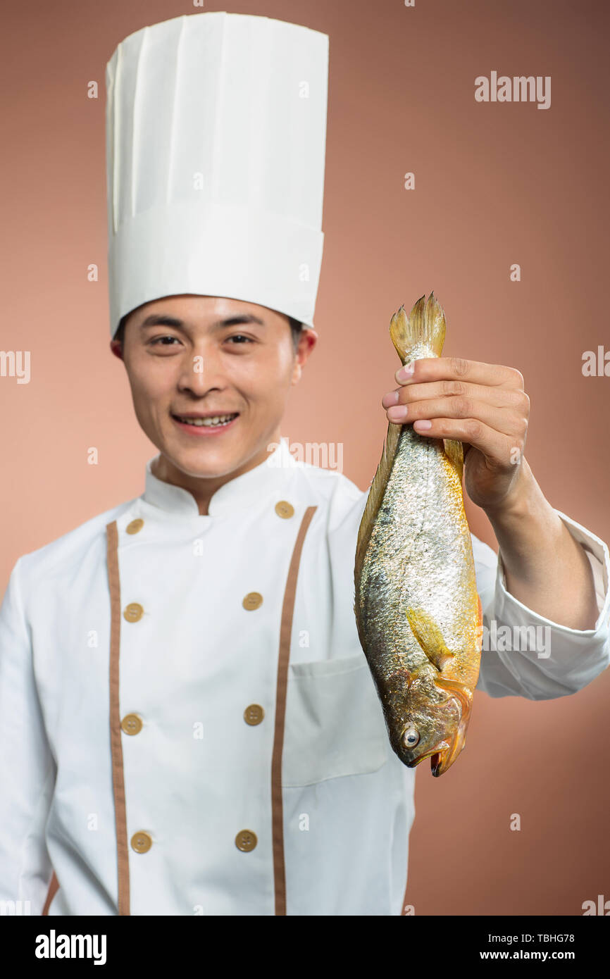 Chef cooking delicious dishes Stock Photo - Alamy