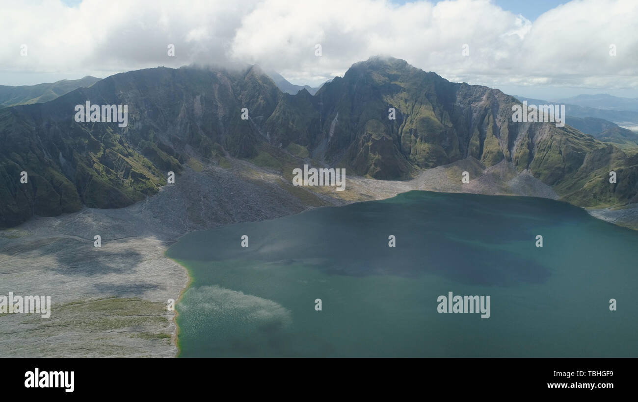 Crater lake of the volcano Pinatubo among the mountains, Philippines, Luzon. Aerial view ...