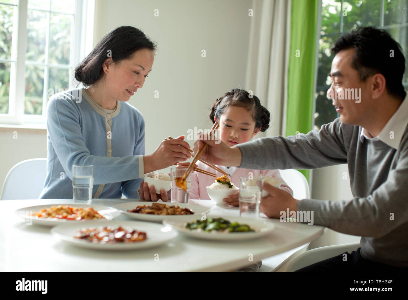 Chinese girl family dinner hi-res stock photography and images - Alamy