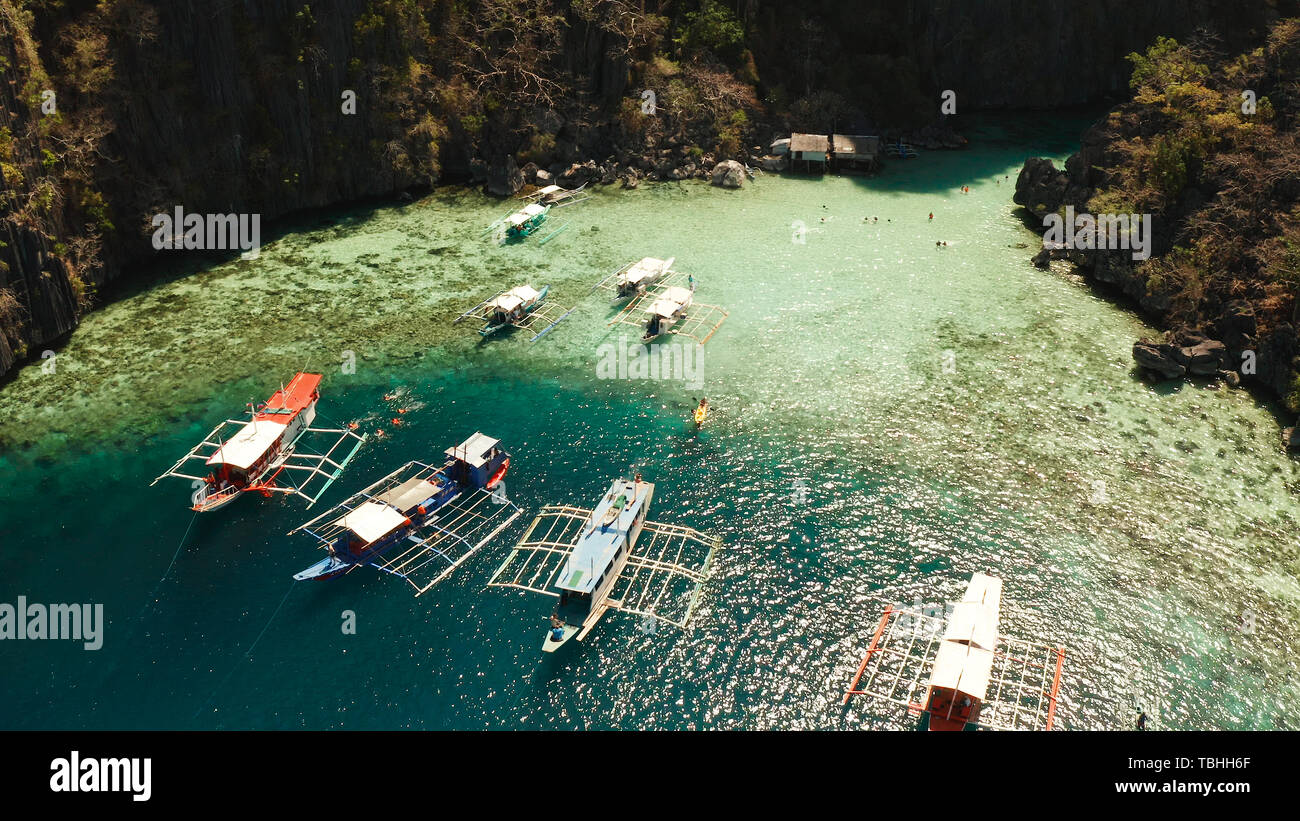 Tourist boats around the beautiful big and small lagoons, aerial view ...