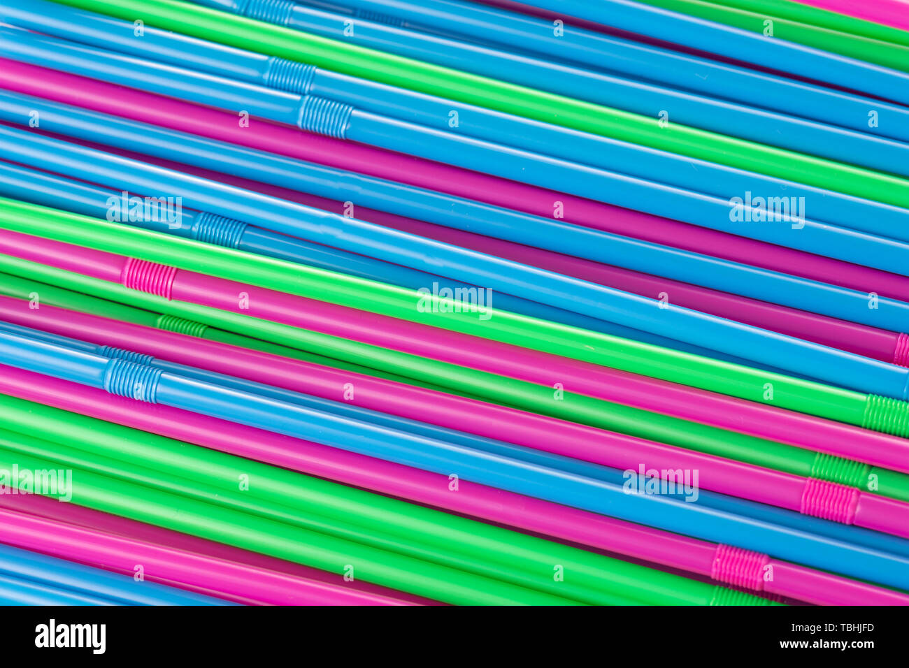 Flat stack of drinking straws. Concept of single use plastic, plastic ...