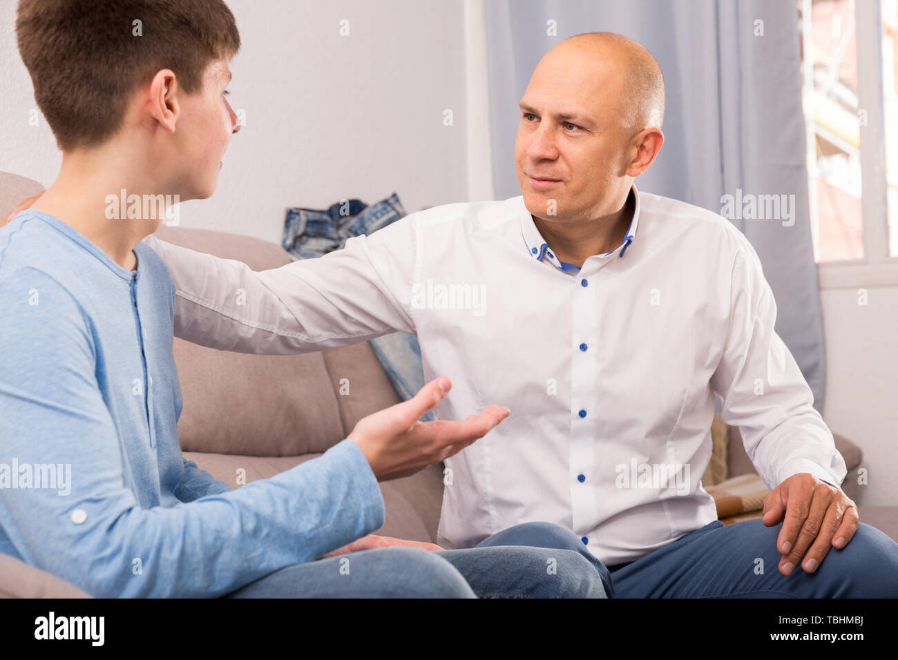 Portrait of father and teenage son hi-res stock photography and images ...