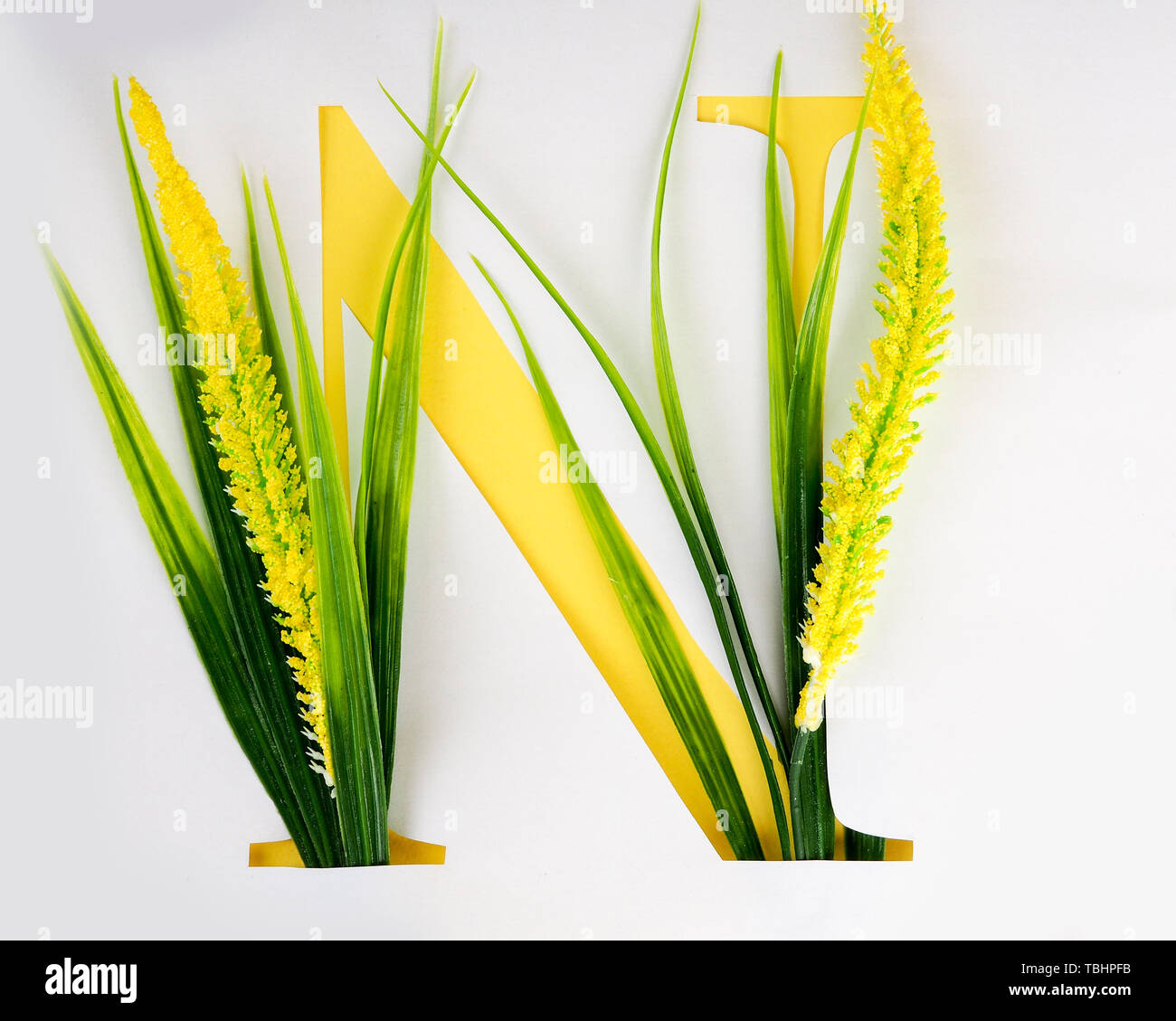Letter alphabet with paper craft yellow flower. ABC concept type as ...