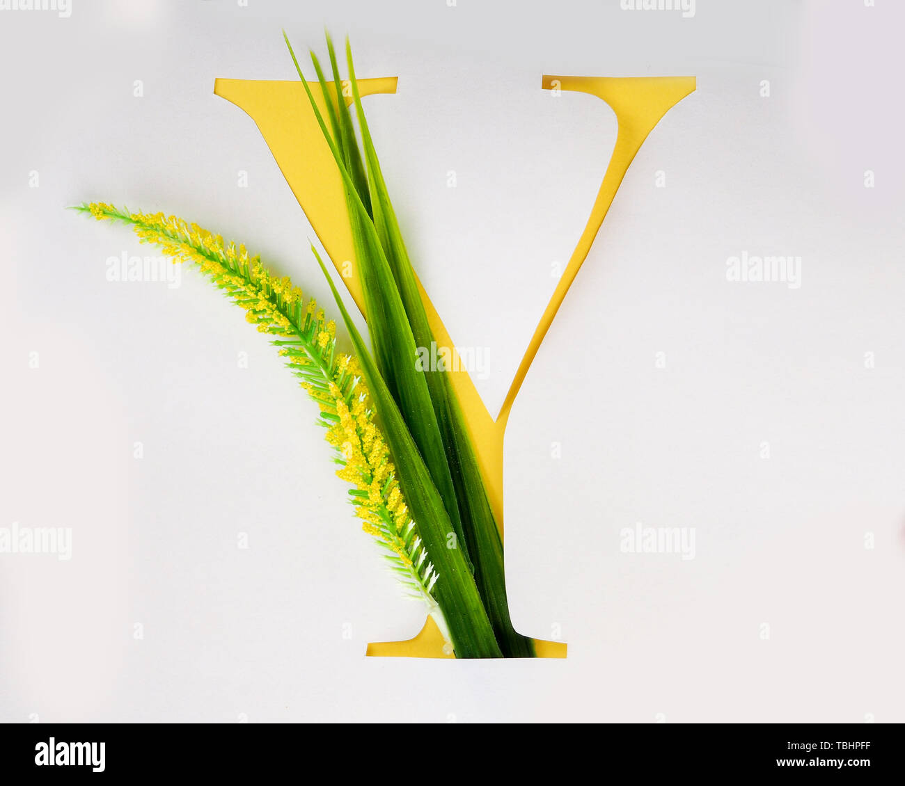 Letter alphabet with paper craft yellow flower. ABC concept type as ...