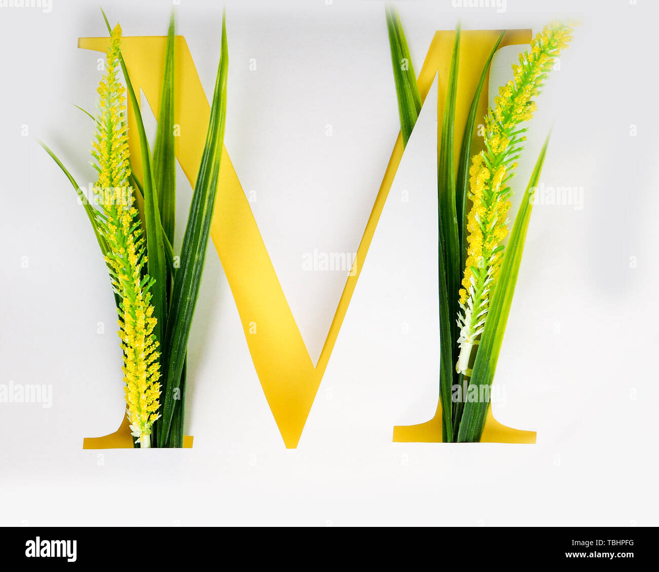 Letter alphabet with paper craft yellow flower. ABC concept type as ...