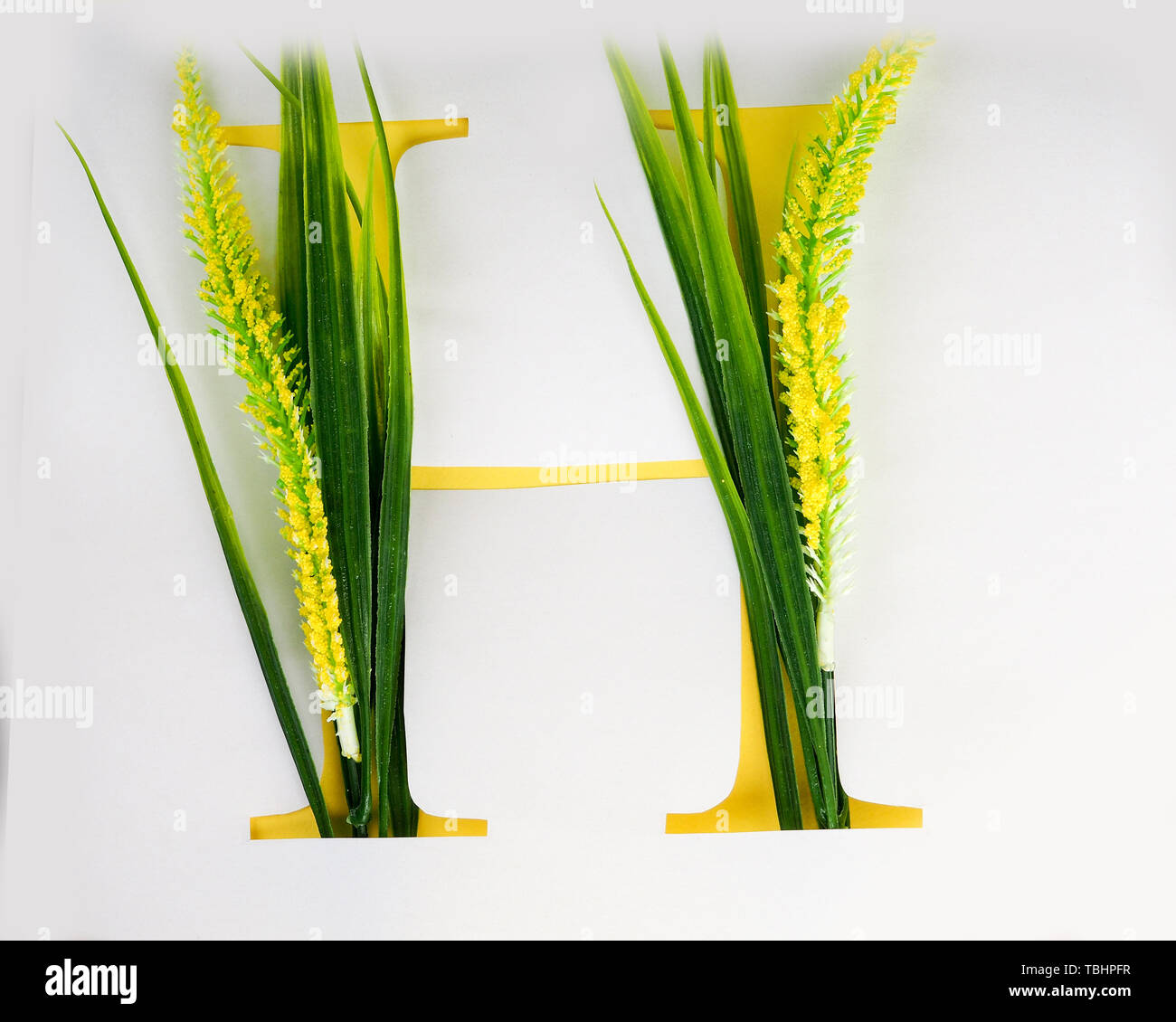 Letter alphabet with paper craft yellow flower. ABC concept type as ...