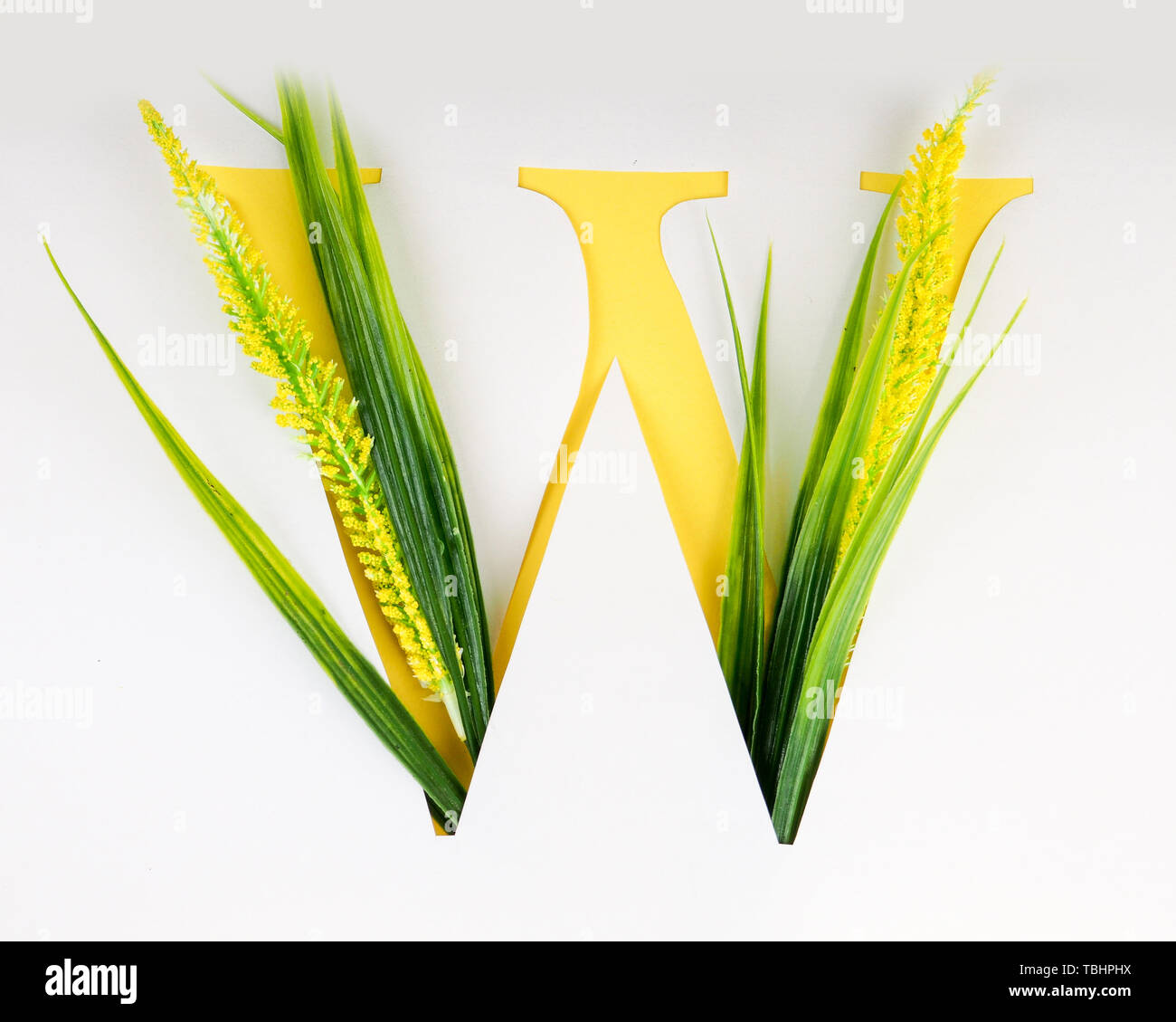 Letter alphabet with paper craft yellow flower. ABC concept type as ...