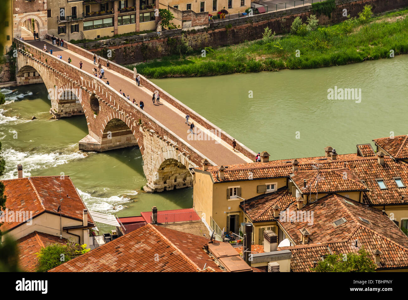 Amazing panorama of the Adige River running along ancient buildings of ...