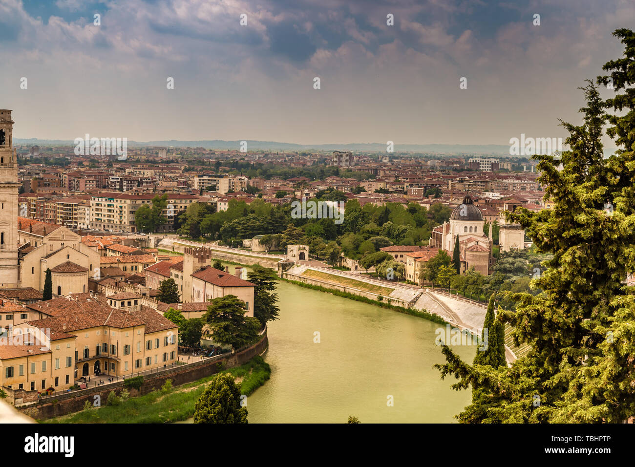 Amazing panorama of the Adige River running along ancient buildings of ...