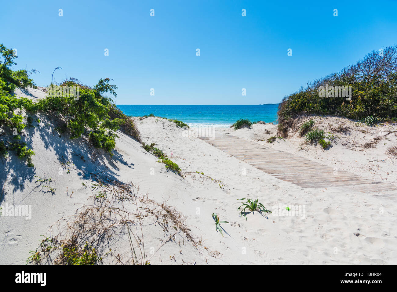 white sand and transparent sea in Maria Pia beach, Alghero Stock Photo ...