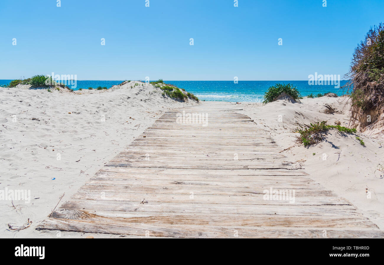 white sand and transparent sea in Maria Pia beach, Alghero Stock Photo ...