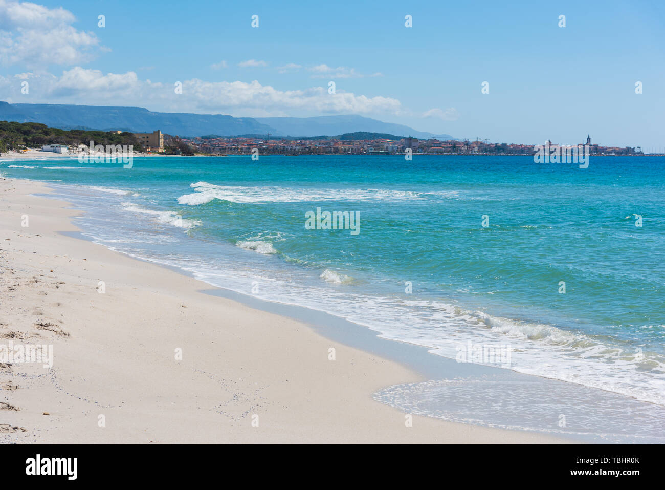 white sand and transparent sea in Maria Pia beach, Alghero Stock Photo ...
