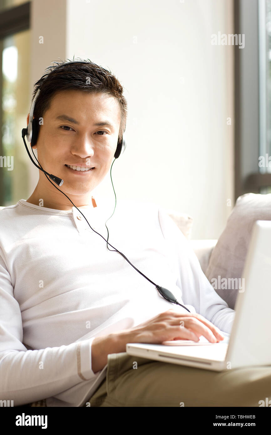 A man surfing the Internet Stock Photo - Alamy