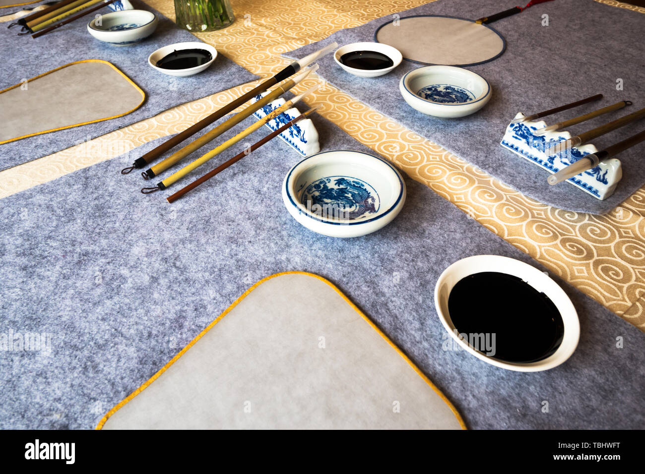 Chinese calligraphy tools on table Stock Photo - Alamy